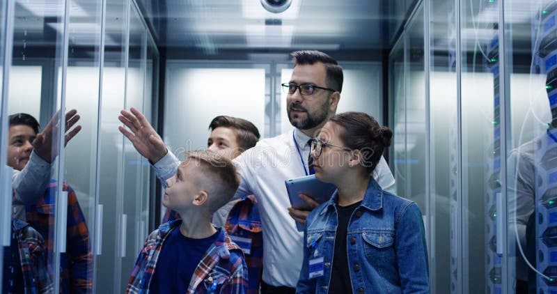 It Technician Showing Around Children in a Server Park Stock Image ...