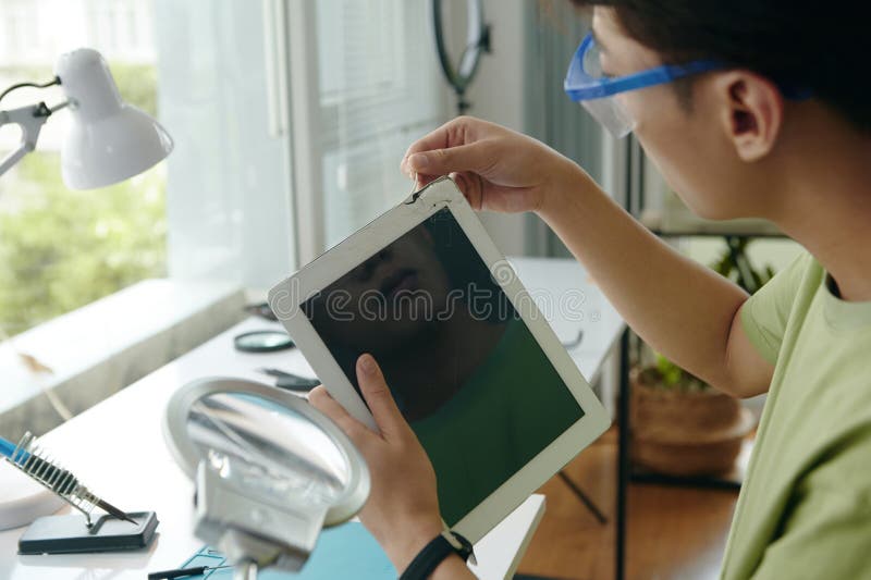 Technician Repairing Broken Tablet PC Stock Photo - Image of tool ...