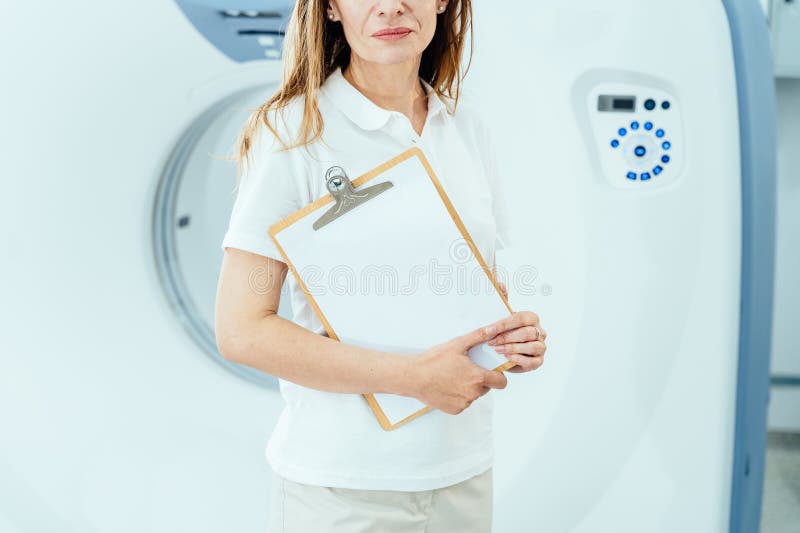 Technician Standing in Front of MRI Scanner Stock Image - Image of ...