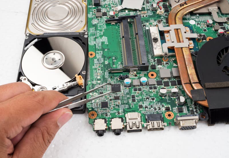 Man Fixing a Laptop Computer Stock Photo - Image of fixing, teenager ...