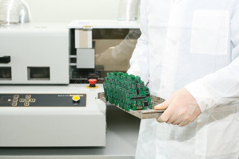Technician with Computer Circuit Board with Chips. Spare Parts and ...