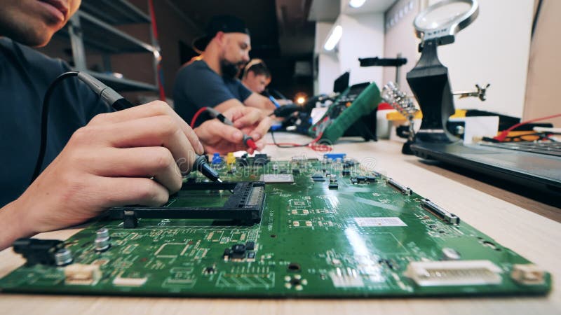 Technician Testing Robotic Bionic Arm at Prosthetic Manufacturing Stock ...