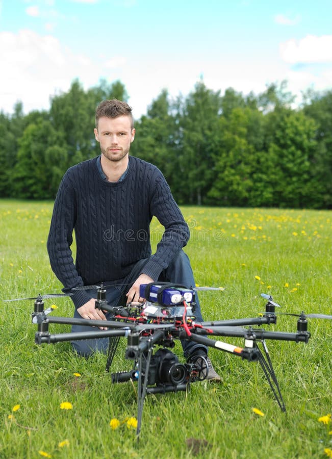 Technician with UAV Drone in Park Stock Image - Image of camera ...
