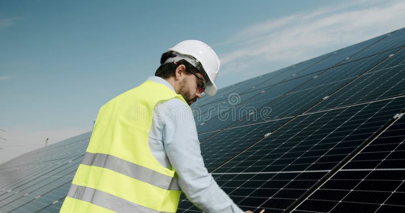 The Technician in Uniform Makes Notes in the Notebook. Stock Video ...