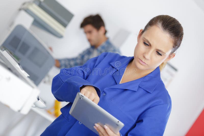 Technician Using Digital Tablet in Server Room Stock Photo - Image of ...