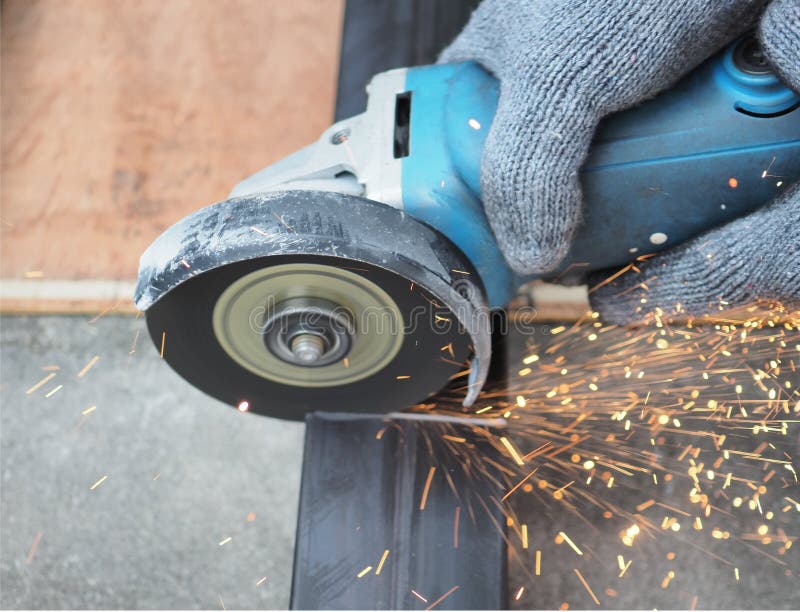 Technician Using Electric Grinder To Cut Square Pipe Safely Stock Photo ...