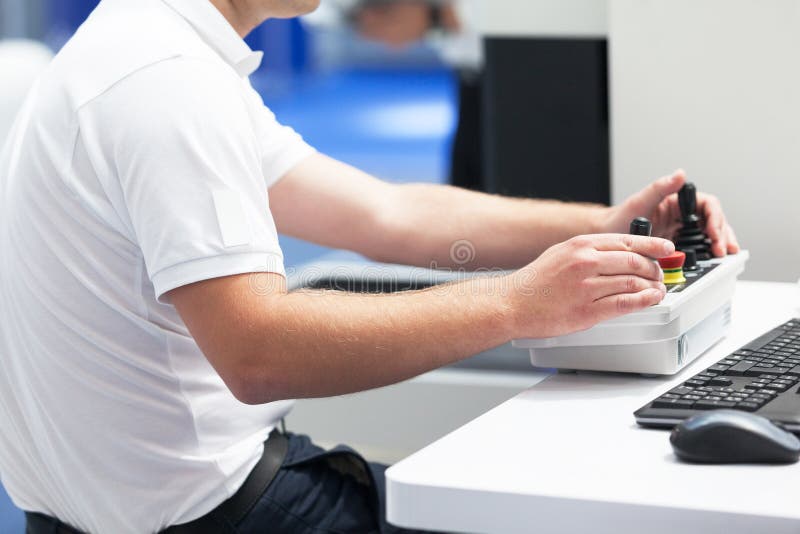 Technician is Using Joystick To Operate Electronic Device Stock Photo ...