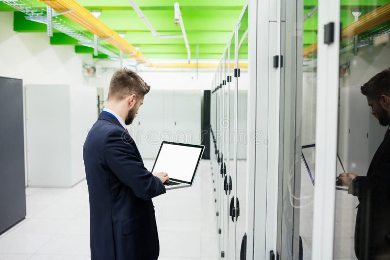 Technician using laptop stock photo. Image of control - 78933368