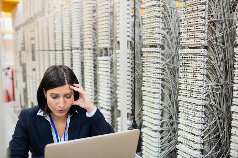 Technician using laptop stock image. Image of electronic - 78697071