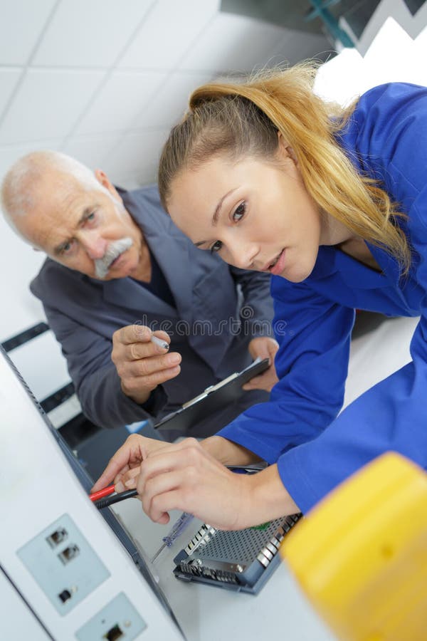 Technician Using Multimeter To Test Appliance Stock Photo - Image of ...
