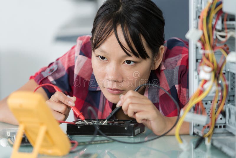 Technician Using Multimeter To Test Computer Component Stock Image ...