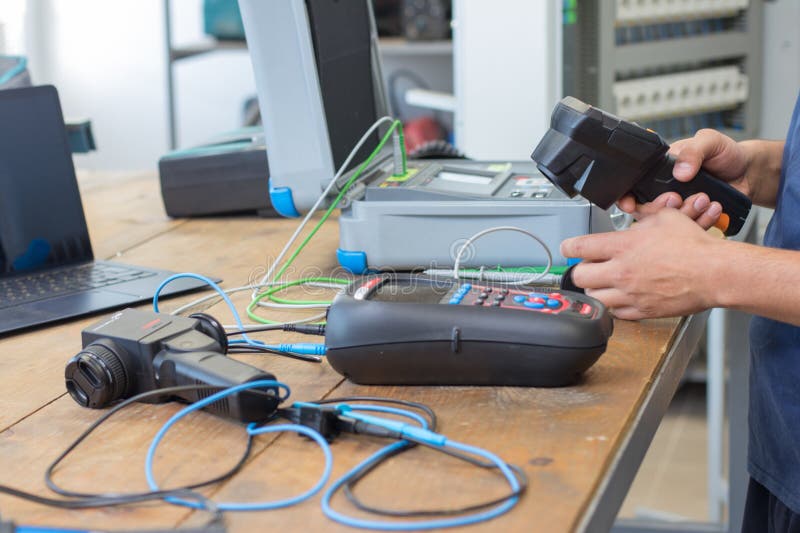 Technician Using Testing Devices in a Technology Laboratory Editorial ...