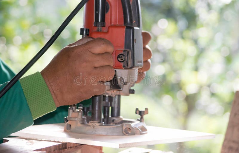 The Technician is Using a Wood Punching Machine Stock Image - Image of ...
