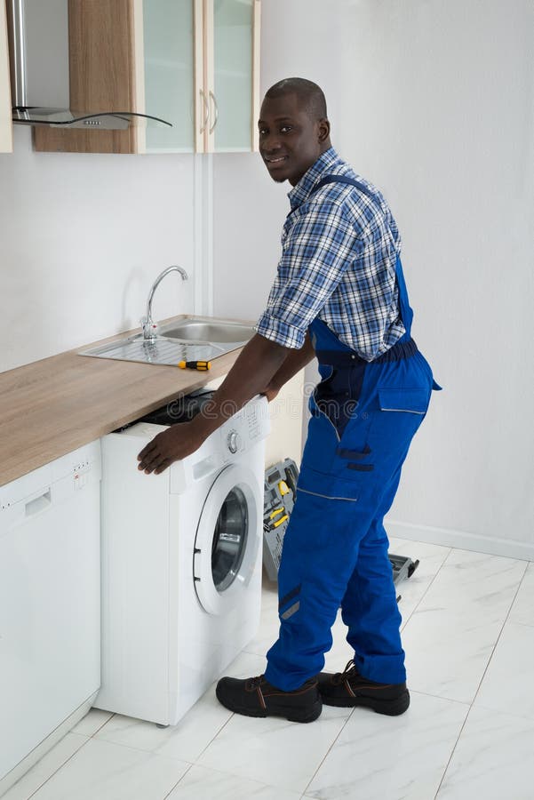 898 Black Man Washing Machine Stock Photos - Free & Royalty-Free Stock ...