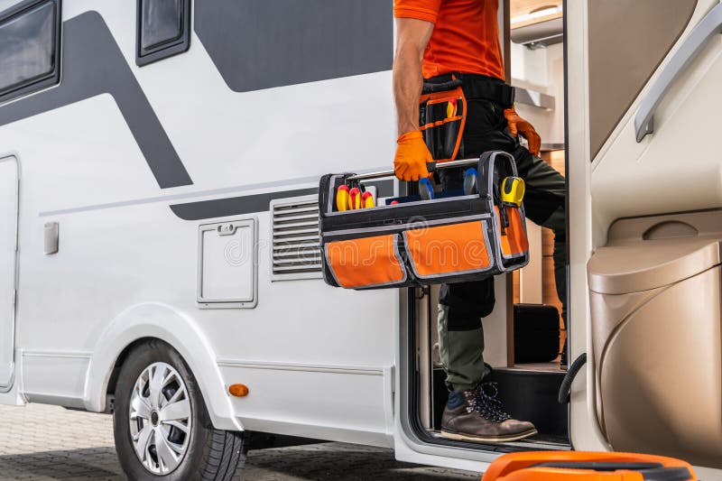 RV Technician Entering a Motorhome with Toolbox Stock Photo - Image of ...
