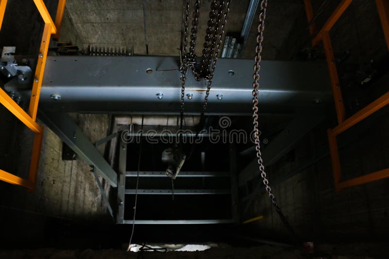 Technician Welding To Maintain Lift in Factory Stock Photo - Image of ...