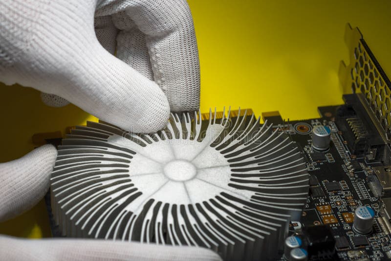 A Technician in White Antistatic Gloves Assembling Cooling Radiator ...