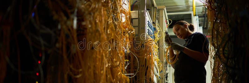 Technician Wiring Network Cables in a Server Room Stock Photo - Image of data, configuration ...