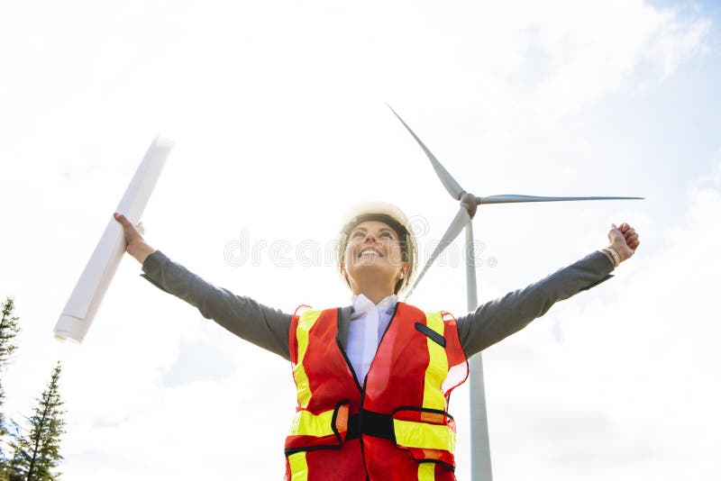 A Technician Woman Engineer in Wind Turbine Power Generator Station ...