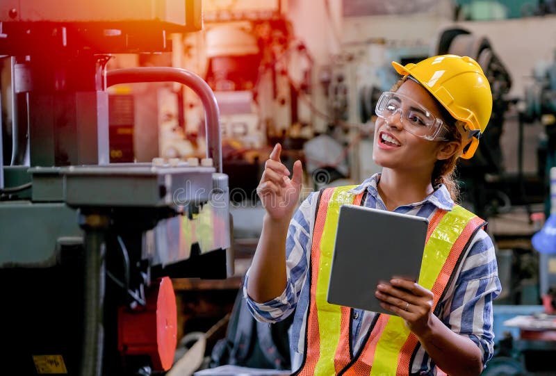 Technician Woman with Tablet Check or Maintenance the Machine in ...