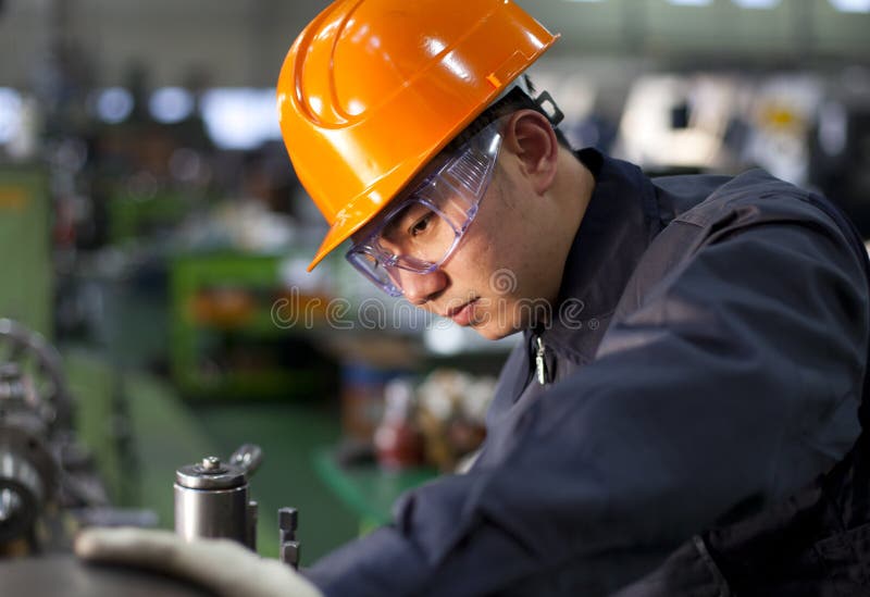 Technician in Factory at Machine Maintenance Stock Photo - Image of ...
