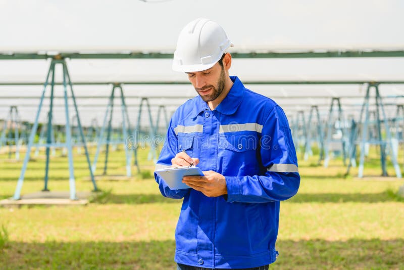 Technician Worker Installing Solar Panels at Solar Cell Farm Stock ...
