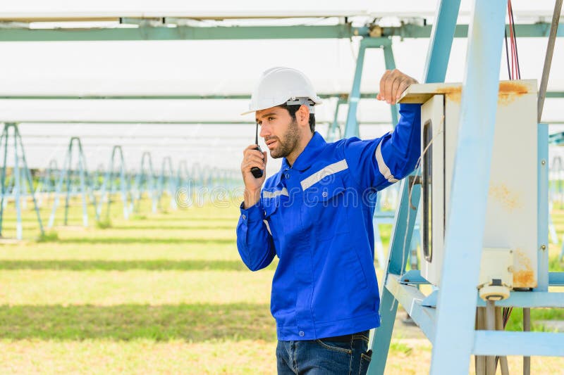 Technician Worker Installing Solar Panels at Solar Cell Farm Stock ...