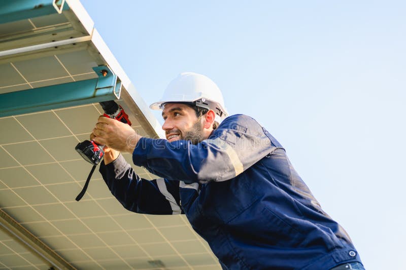Technician Worker Installing Solar Panels at Solar Cell Farm Stock ...