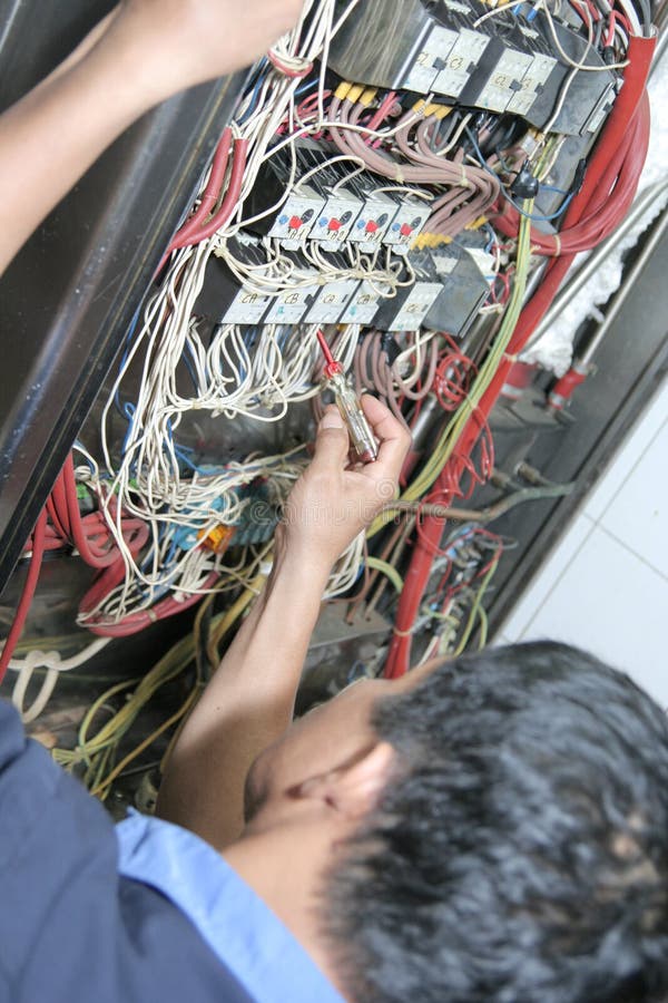 Technician fixing machine stock image. Image of fixing - 6410723