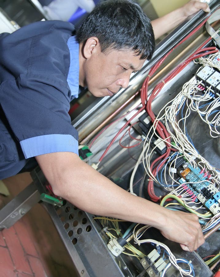 Technician fixing machine stock image. Image of fixing - 6410723