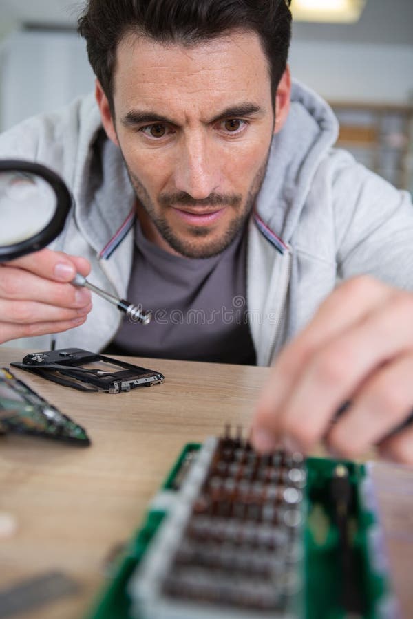 Technician Working on Broken Computer in Office Stock Photo - Image of ...
