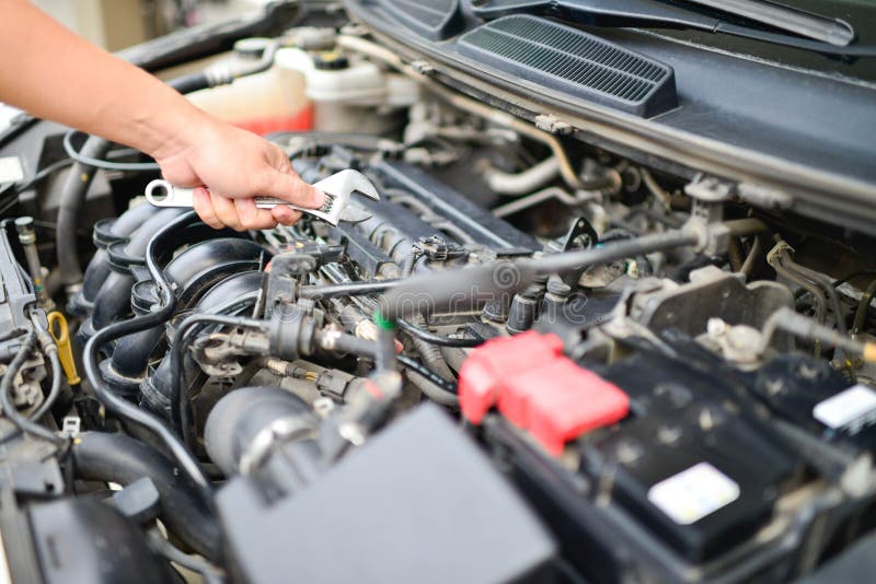 Technician Working on Checking and Service Car Auto Mechanic Working in ...
