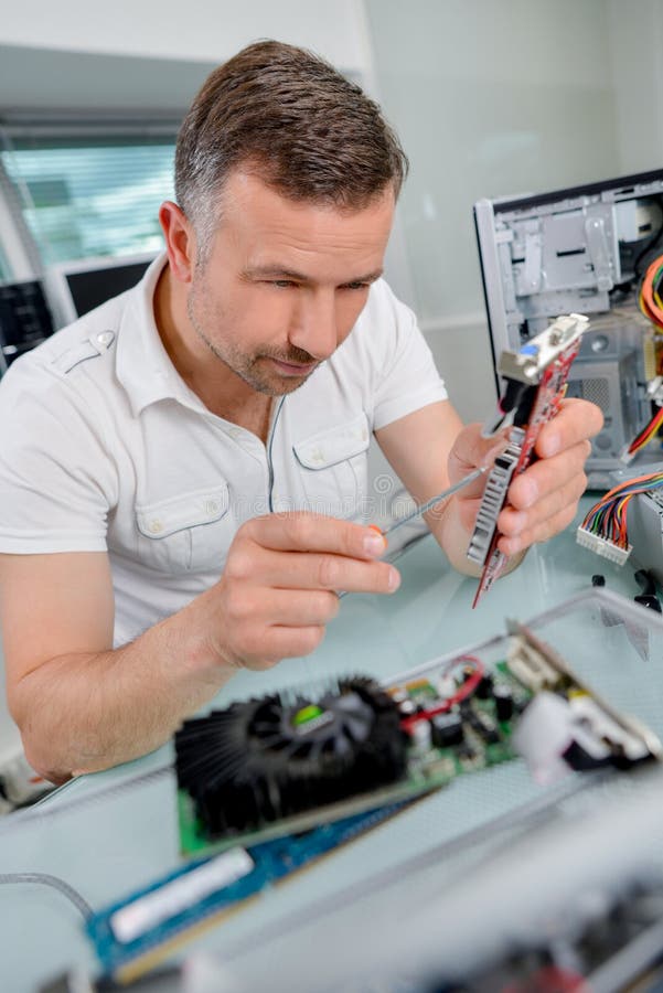 Technician Working on Computer Components Stock Photo - Image of ...