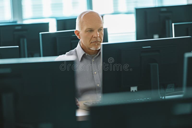 It Technician Working on Computer in Server Room Stock Image - Image of ...