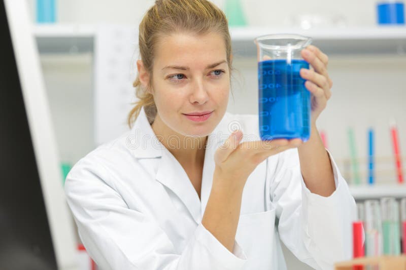 Technician Working with Erlenmeyer Flask in Laboratory Stock Photo ...
