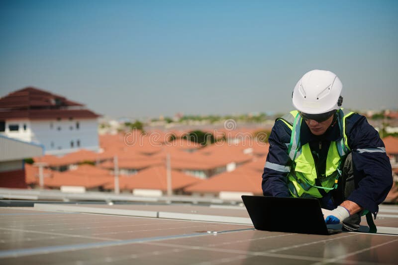 Technician Working Installing Solar Panels on the Roof Stock Photo ...