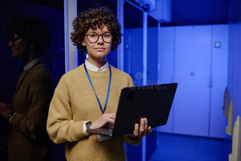 Technician Working on Laptop in Data Center Stock Photo - Image of ...