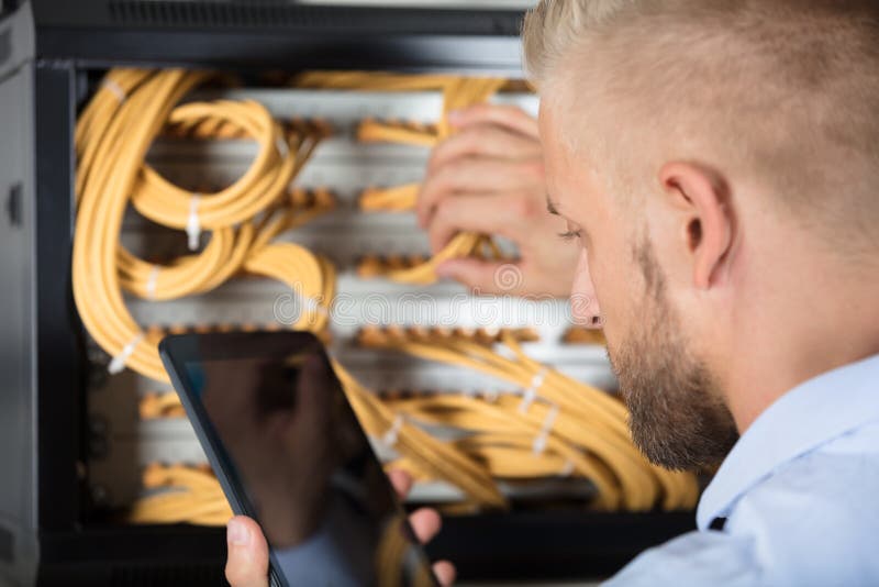 Technician Working on Server in the Data Center Stock Image - Image of ...