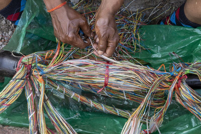 Technician Repairing an Underground Telephone Line Multicolored Wires ...