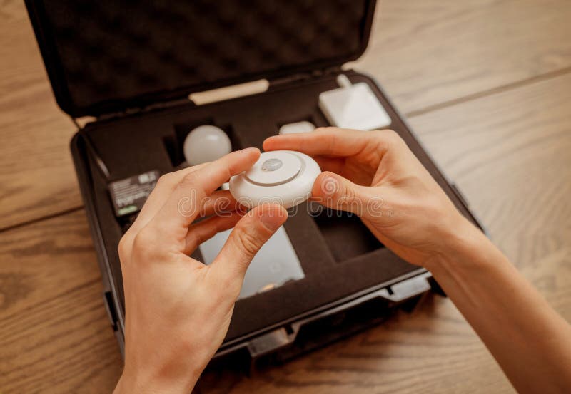 A Technician Works with a Demo Kit of the Smart Home System Stock Photo ...