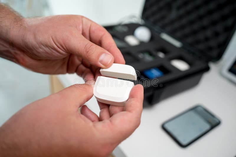 A Technician Works with a Demo Kit of the Smart Home System Stock Photo ...