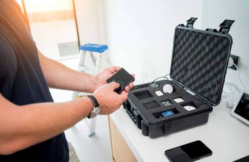 A Technician Works with a Demo Kit of the Smart Home System Stock Image ...