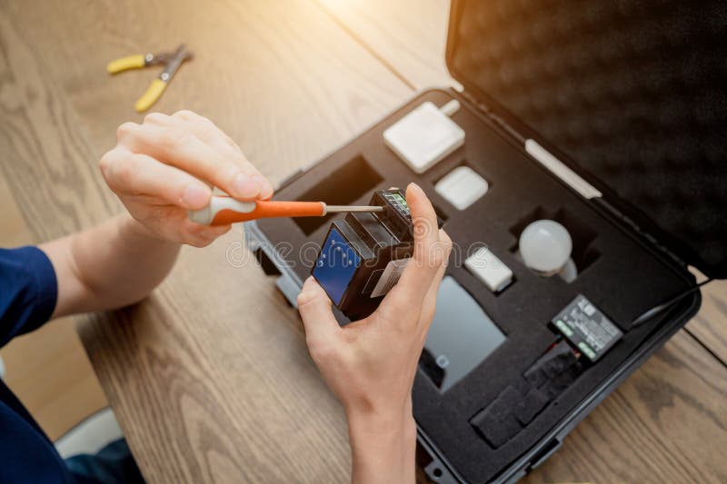 A Technician Works with a Demo Kit of the Smart Home System Stock Image ...