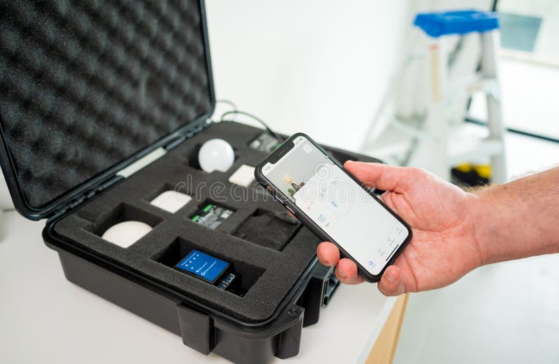 A Technician Works with a Demo Kit of the Smart Home System Stock Image ...