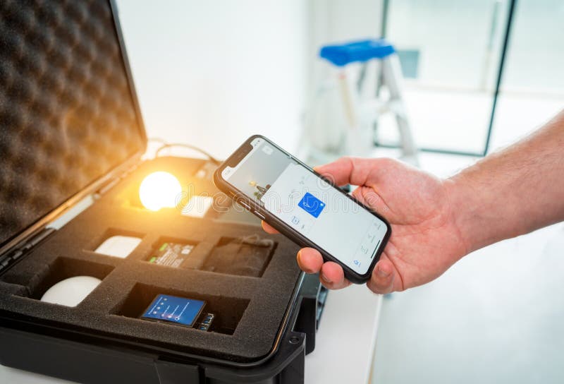 A Technician Works with a Demo Kit of the Smart Home System Stock Photo ...