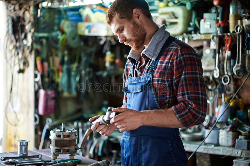 Technician in workshop stock image. Image of engineer - 73907407