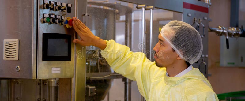 Technician Young Man Adjust Control Panel of Machine in Factory for ...