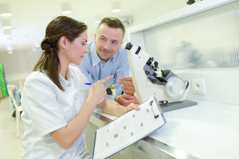 2 Technicians Analyzing Blood Sample in Medical Laboratory Stock Image ...