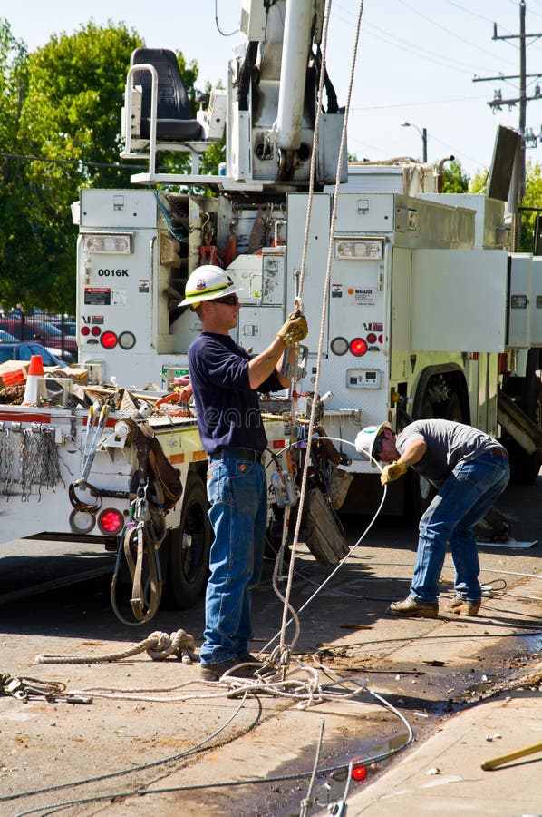 Technicians Clean Up in the Road Editorial Stock Image - Image of smud ...