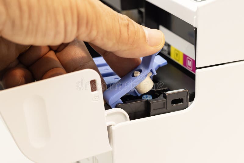 Technicians are Cover the Fill Hole with a Seal of an Inkjet Printer ...